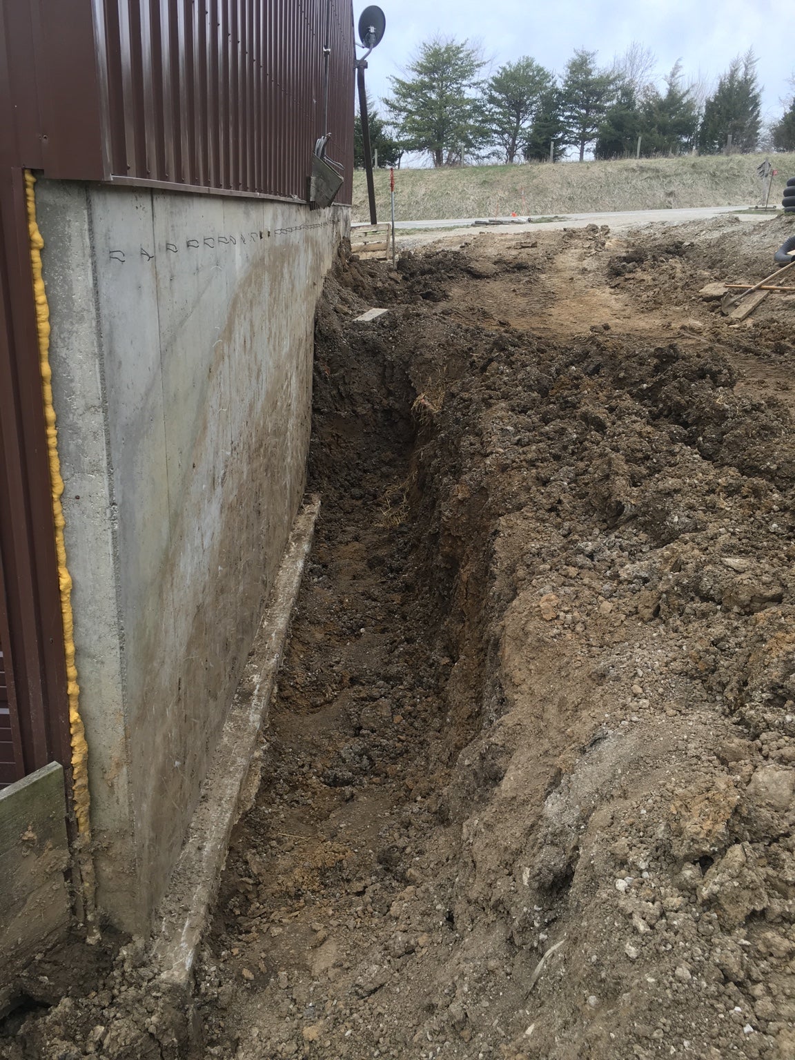 Digging out foundation with 260 Backhoe | Green Tractor Talk