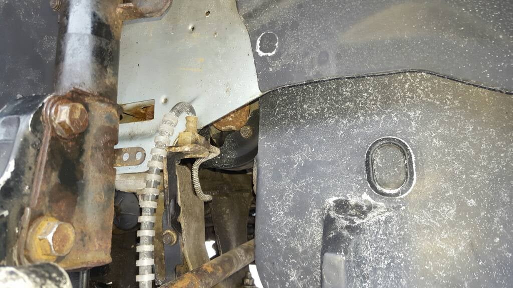 Coolant leak, small metal pipe hanging down | The Chrysler Minivan Fan ...