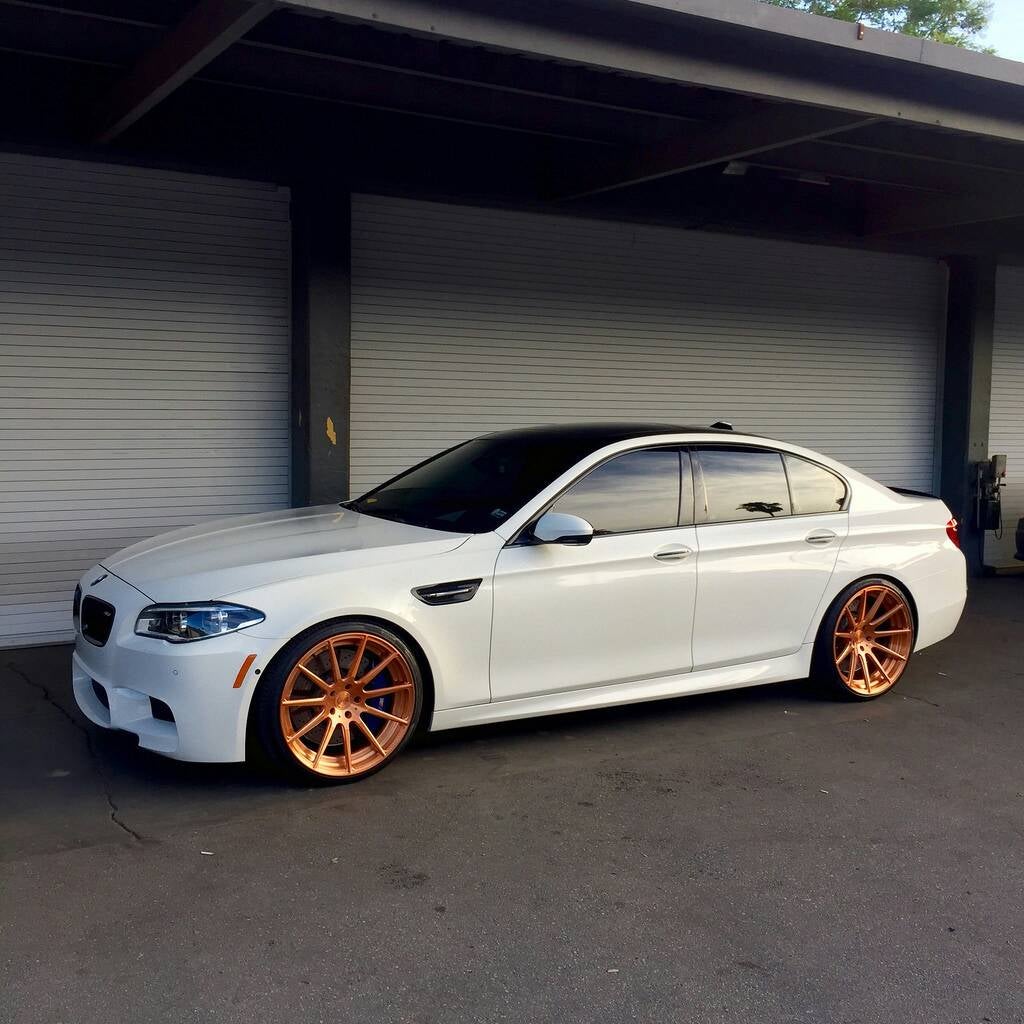 Gold Wheels White Car