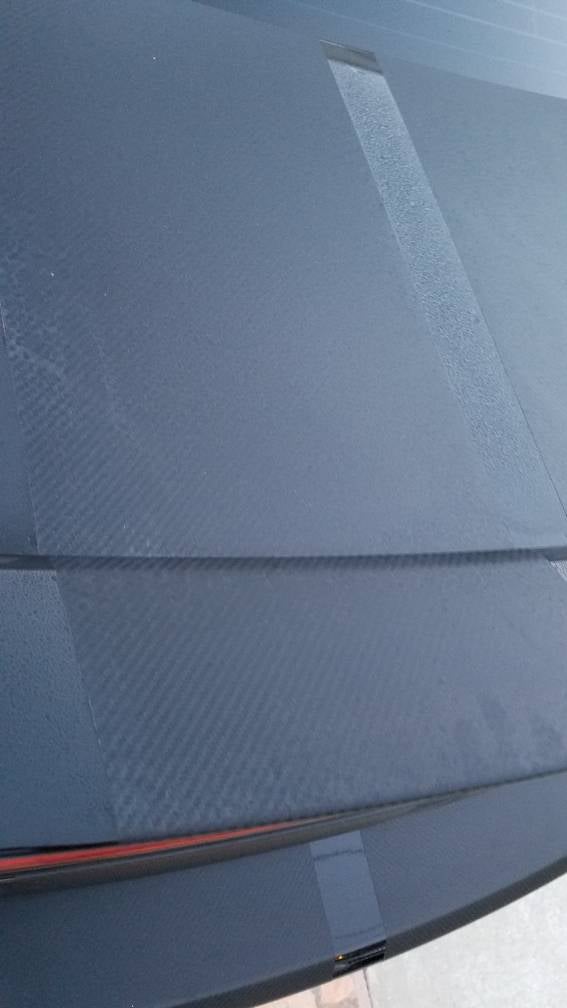 Carbon stripes have white spots in them | SRT Hellcat Forum