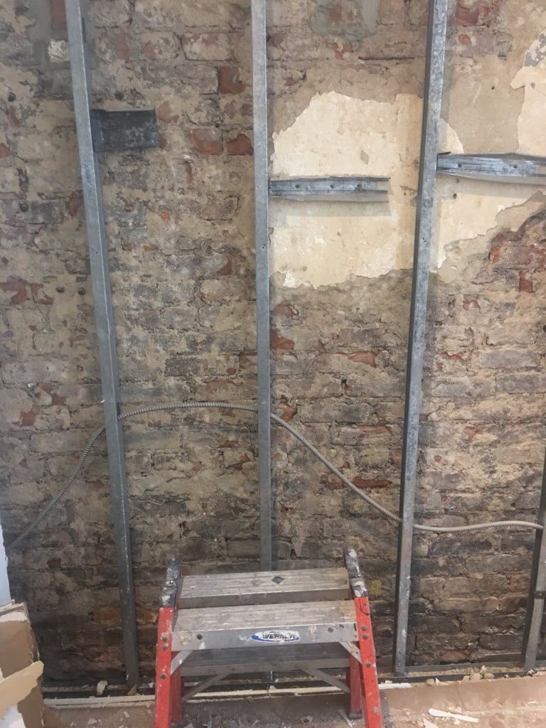 Removing stucco/cement from interior brick wall | Contractor Talk ...