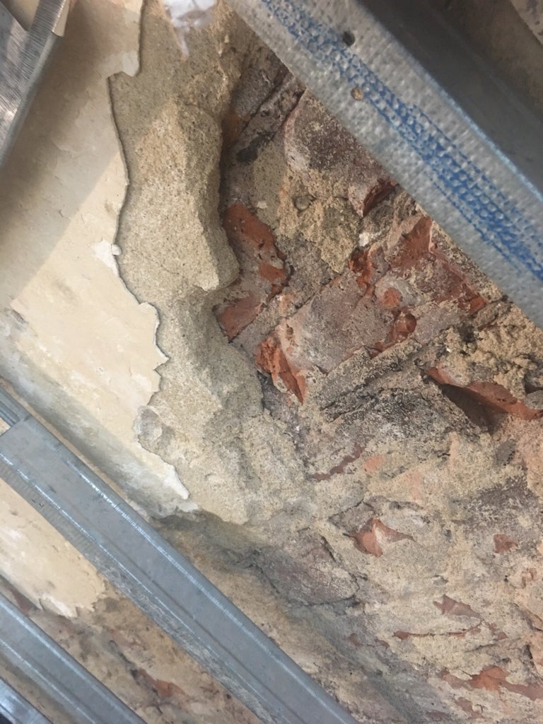 Removing stucco/cement from interior brick wall | Contractor Talk ...