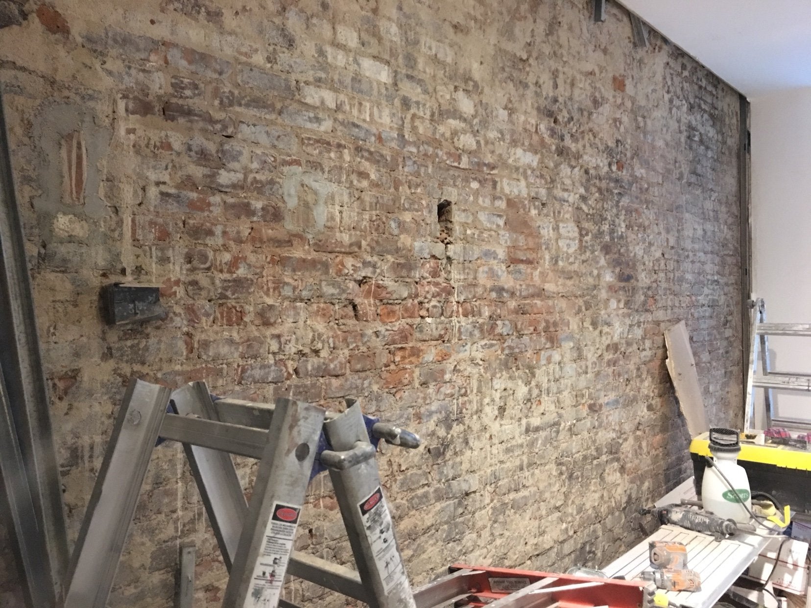 Removing stucco/cement from interior brick wall | Contractor Talk ...