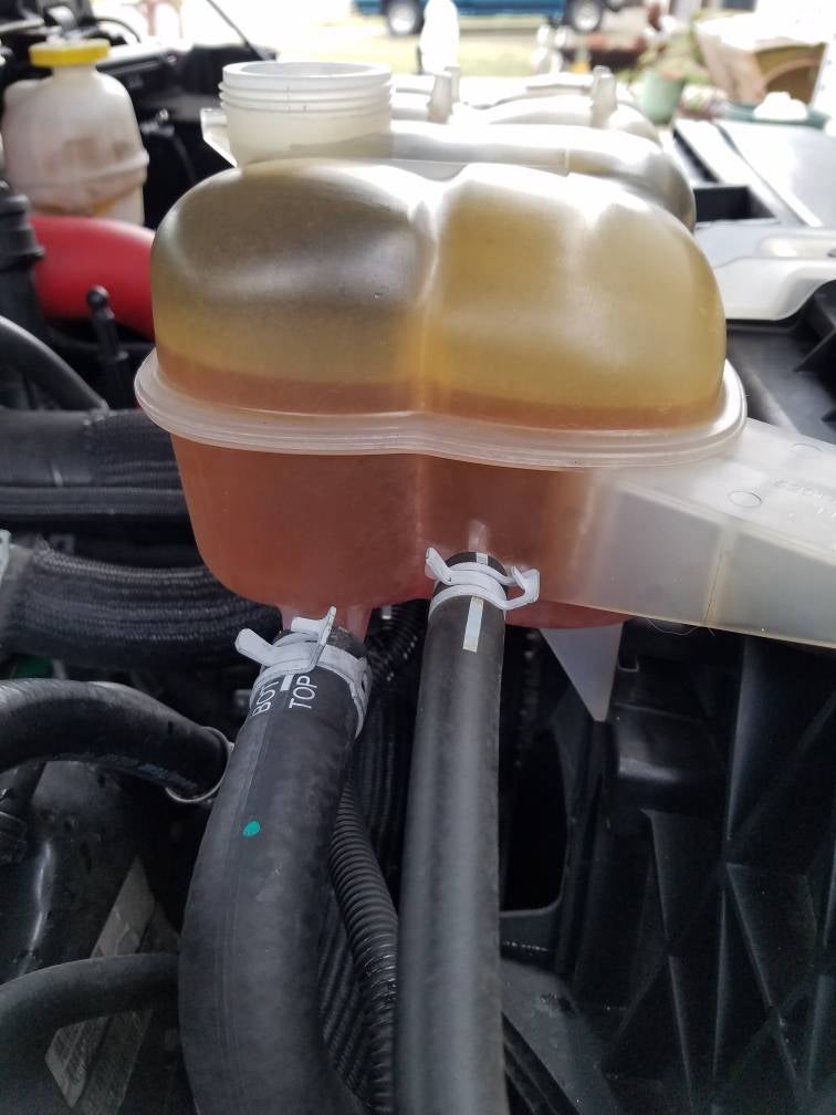 Blackish substance in coolant reservoir | RAM 1500 Diesel Forum