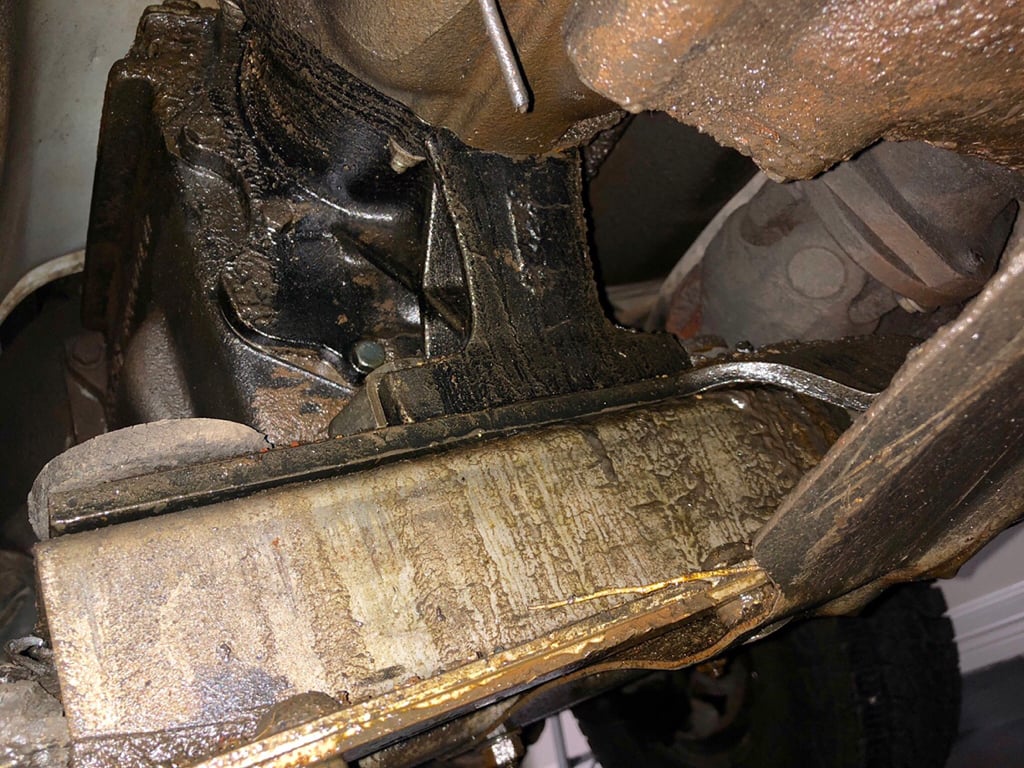 Lots of oil residue around Getrag Transmission and possible loose ...