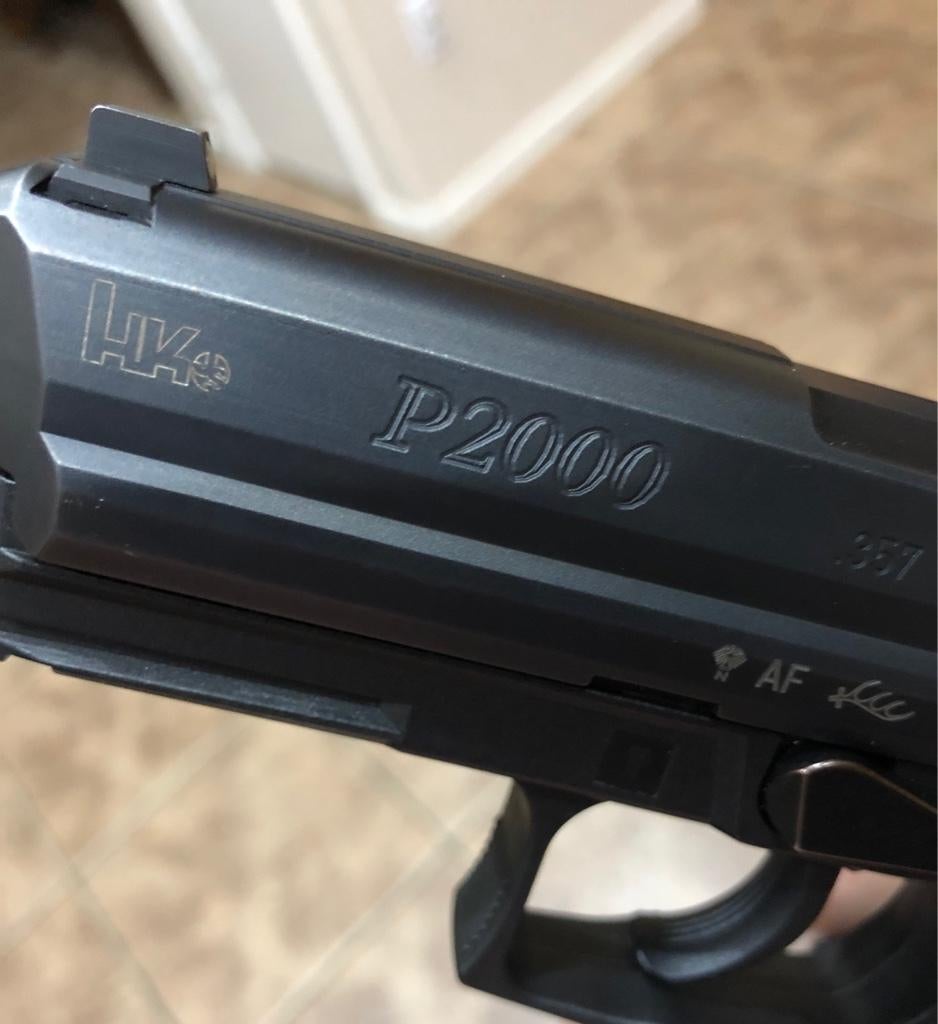 Laser etched vs roll mark slide logo. | HKPRO Forums