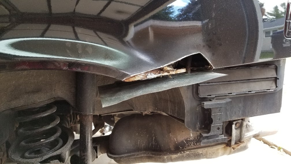 Has anyone repaired the quarterpanel rust spot over the rear bumper ...
