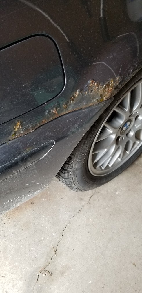 Has anyone repaired the quarterpanel rust spot over the rear bumper ...