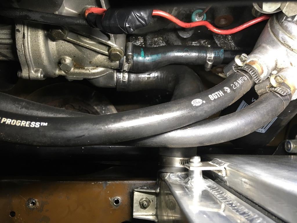 Coolant hose lower adapter coolant pump to metal crack pipe which one ...