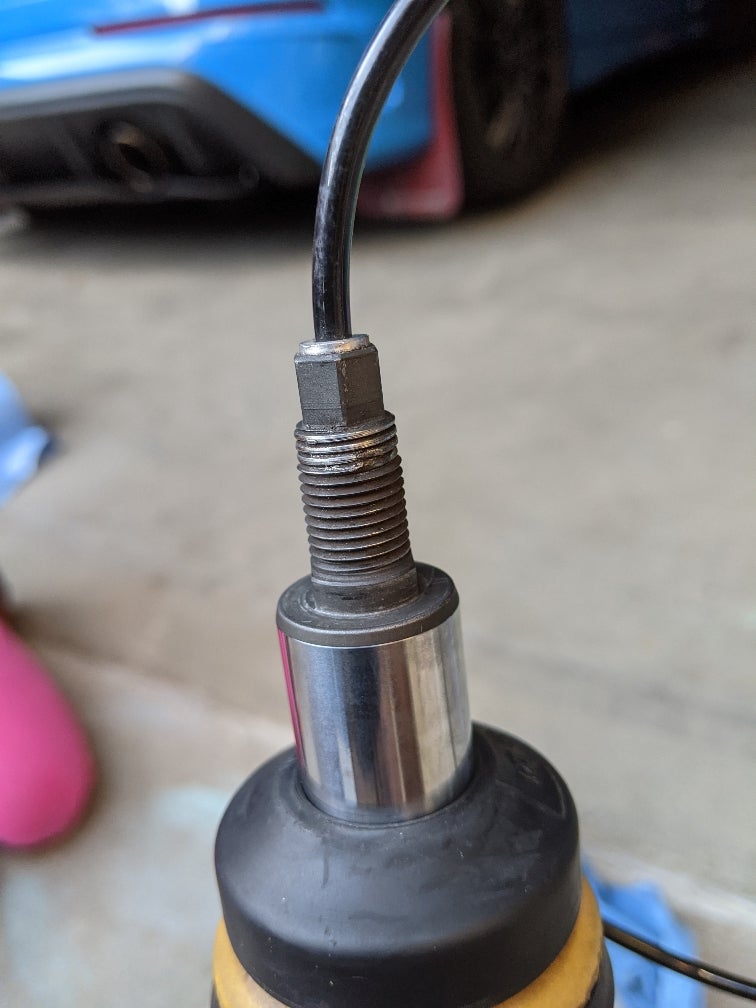 Front strut top mount bolt coming loose...( anyway to tighten on ...