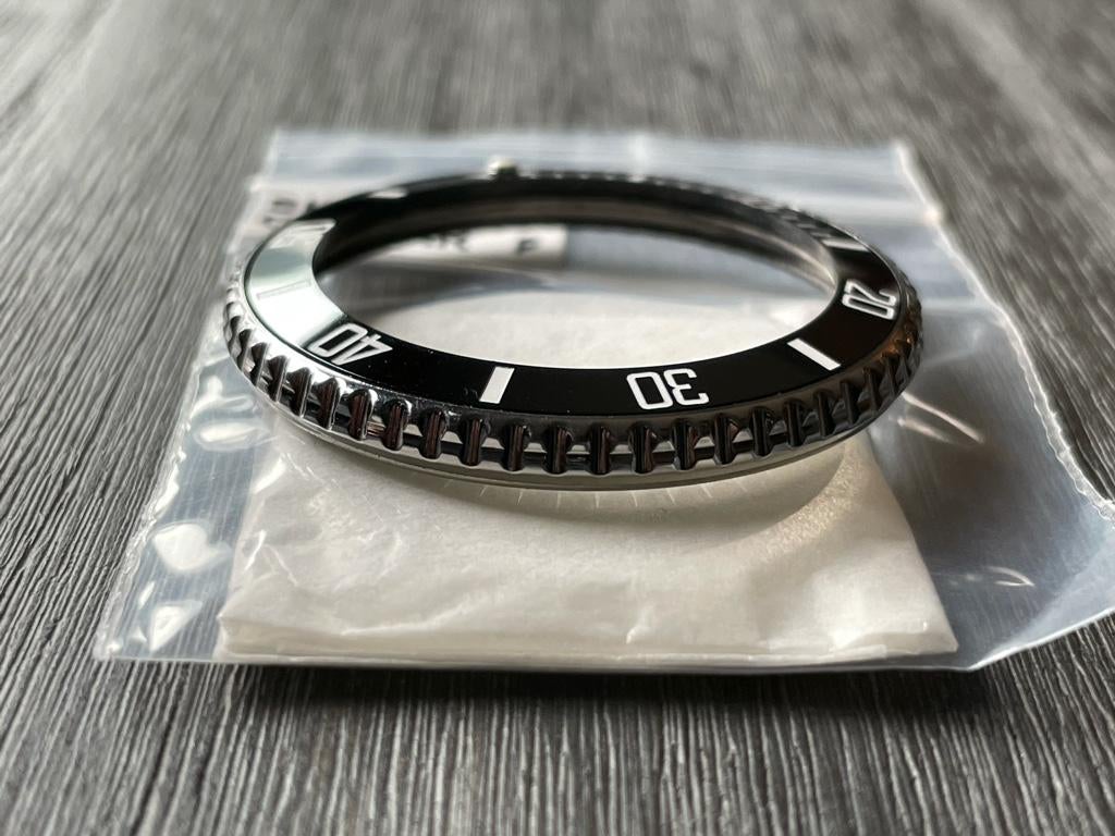 SOLD Seiko SKX mod parts- DLW ceramic insert/OEM bezel and flat ...