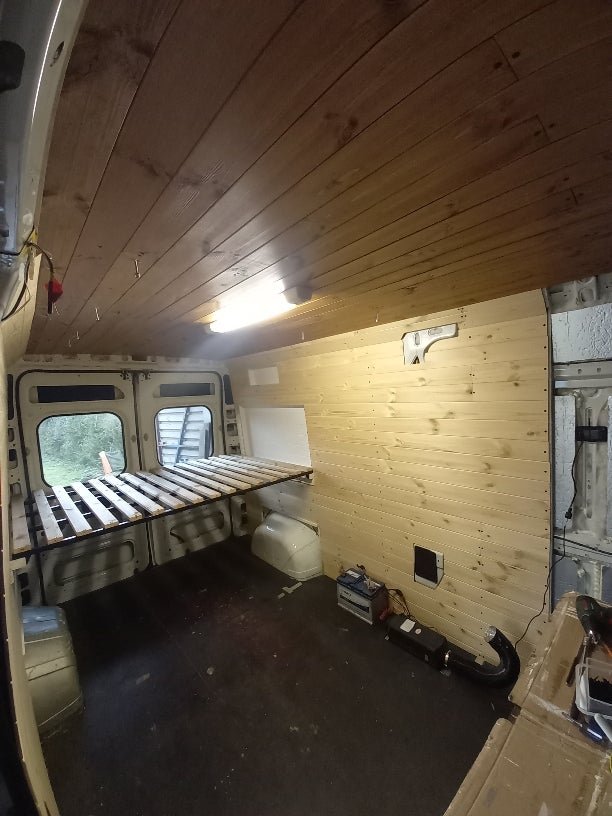 Maximising garage height using steel bed frame, featuring wall insets ...