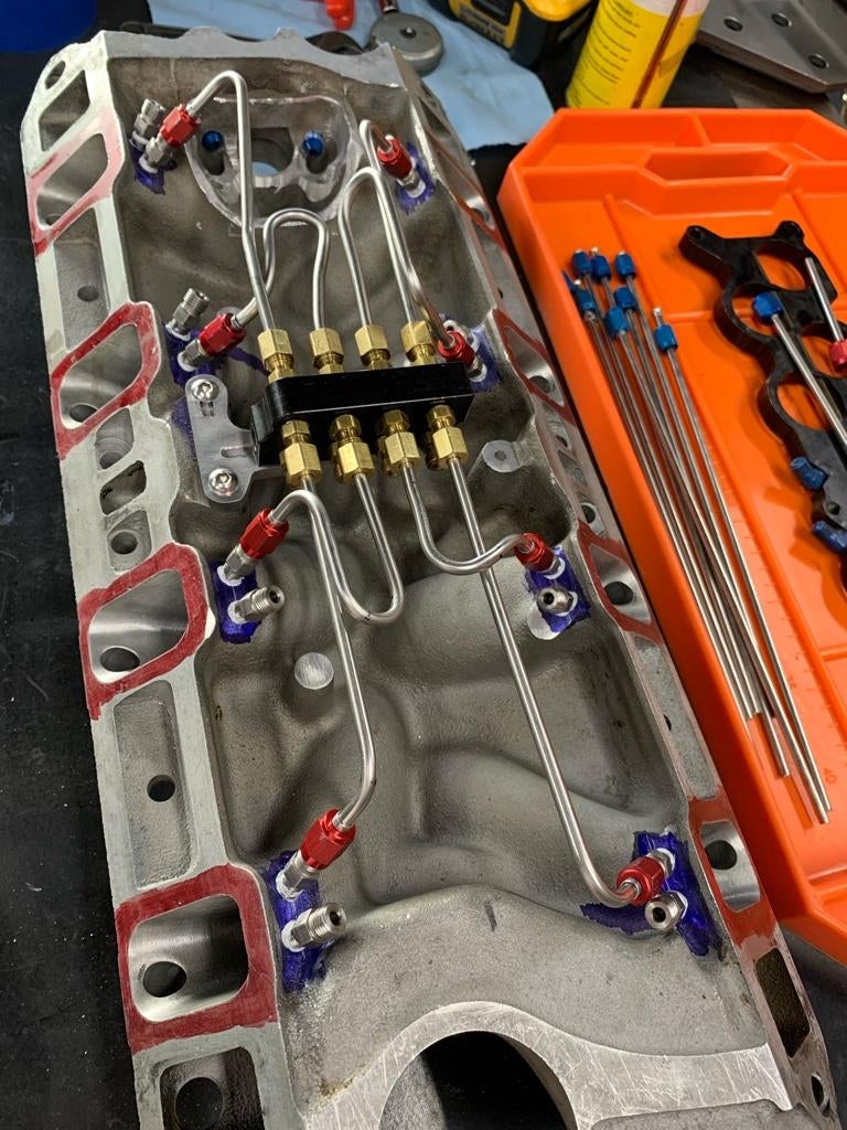 Under Lower Manifold hidden nitrous system. | Ford Mustang Forums