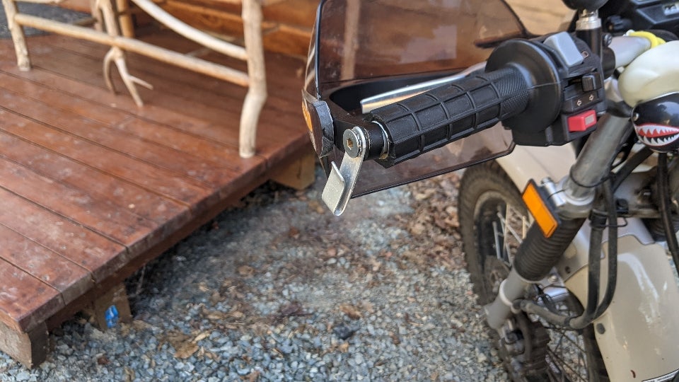 Helmet Holder - easy access utilizing Tusk D-flex Handguards. | TW200 Forum