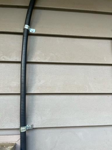 Good product to cover liquid tight conduit running over siding? | DIY ...